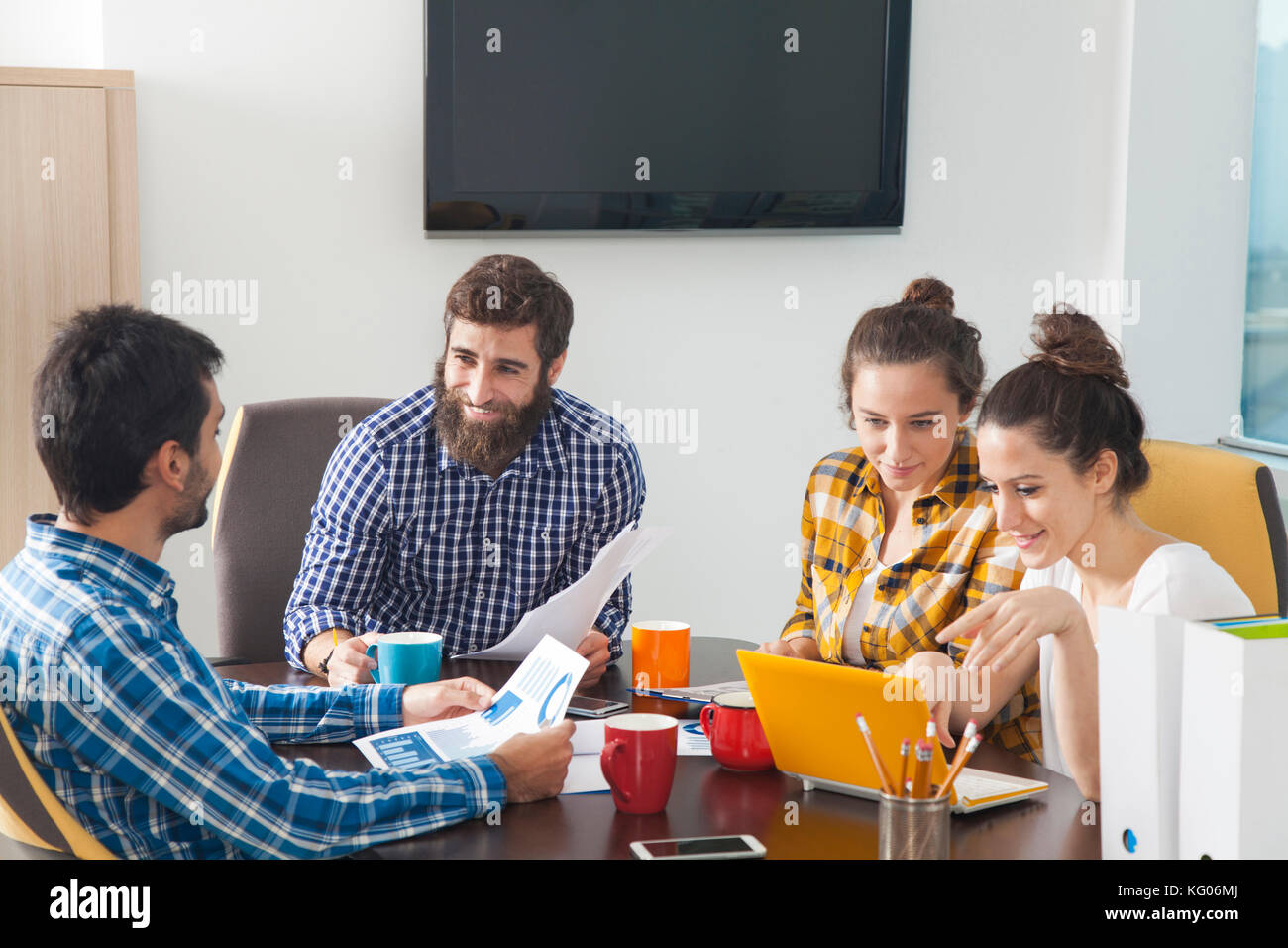 Group of happy creative people working in the office Stock Photo - Alamy