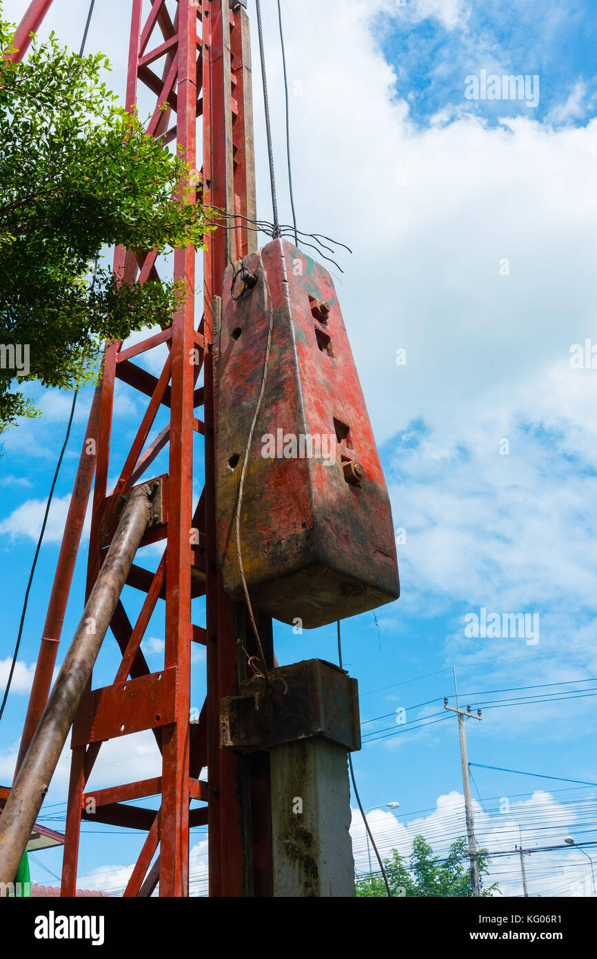Pile driving crane doing lifting operation of piling rod at ...