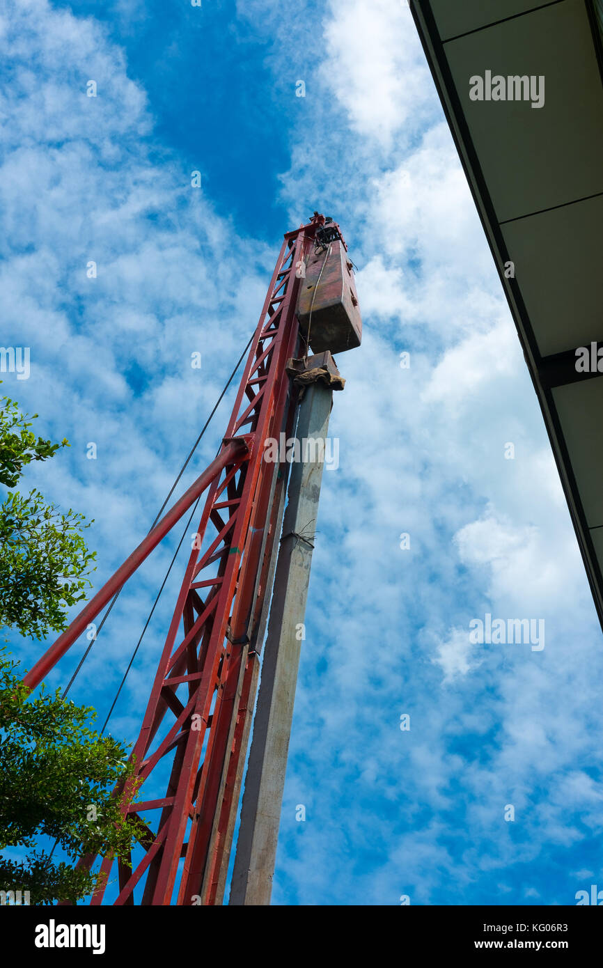 Pile driving crane doing lifting operation of piling rod at ...