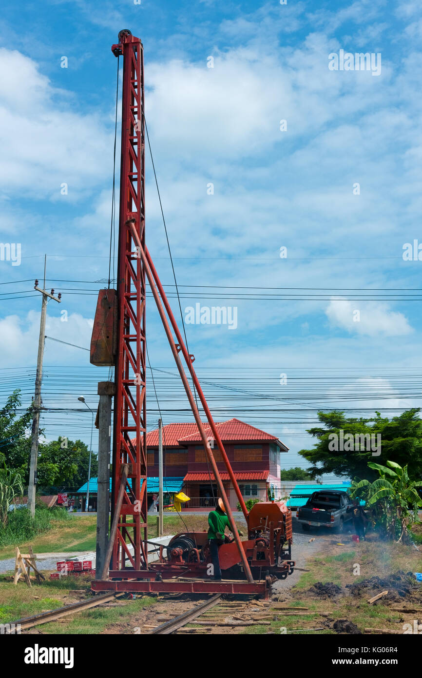 Pile driving crane doing lifting operation of piling rod at ...