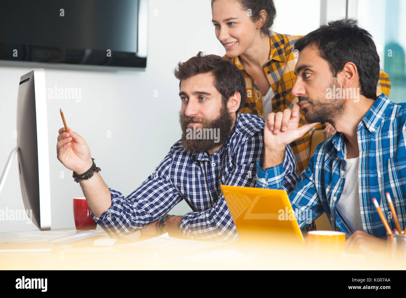 Creative group working together in office Stock Photo - Alamy