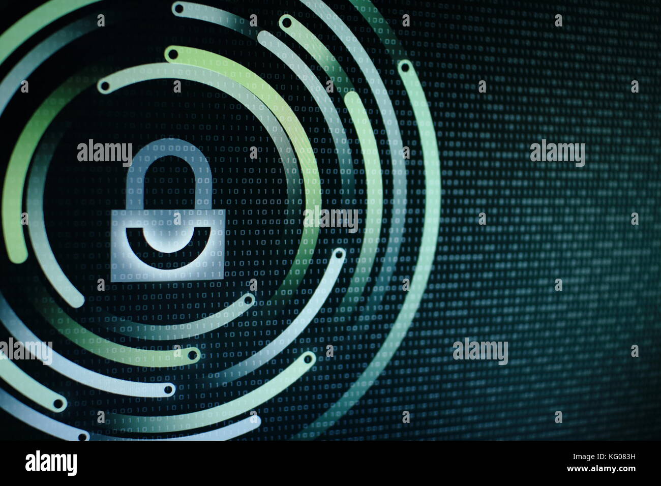photo of computer screen display with black graphic lock symbol. Binary ...