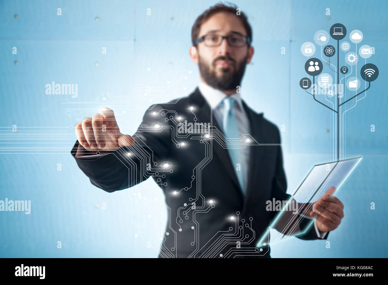 Businessman standing and working with touch screen technology Stock ...