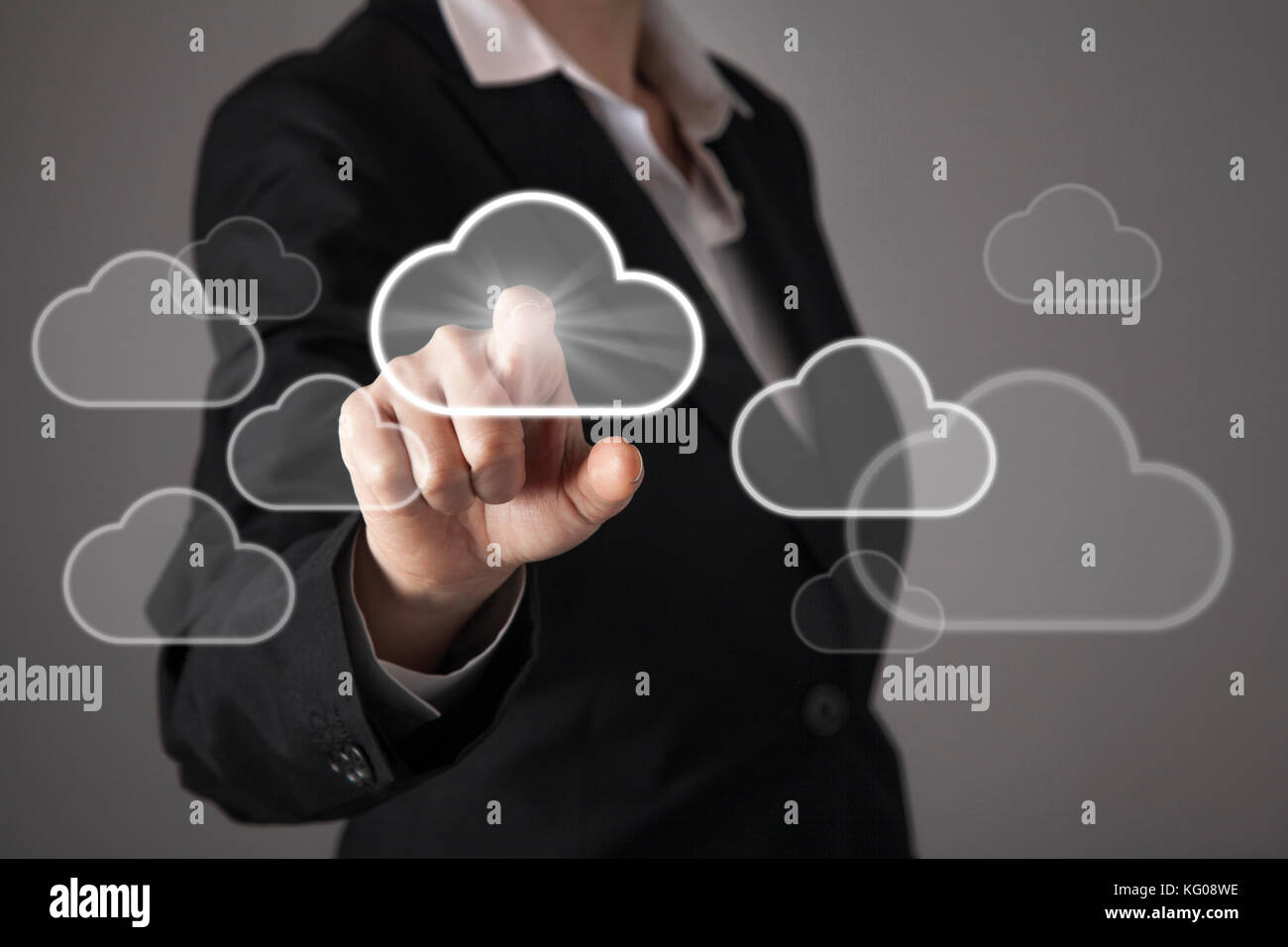 Businesswoman in front of visual touch screen Stock Photo - Alamy