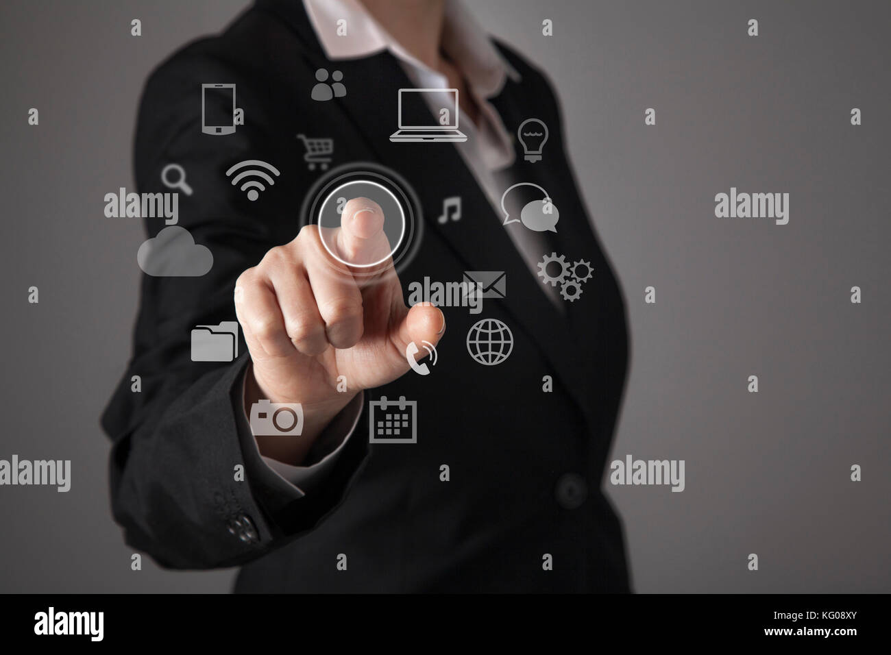 Businesswoman in front of visual touch screen Stock Photo - Alamy