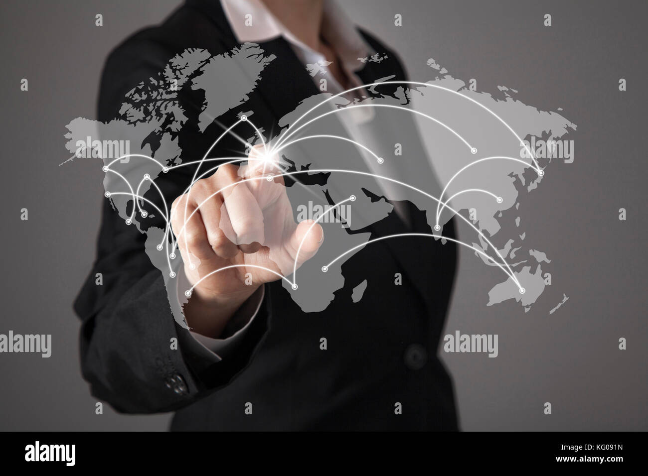 Businesswoman in front of visual touch screen. - Earth map from: http ...