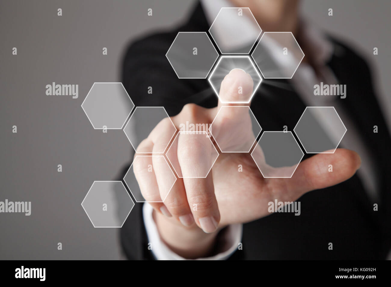 Businesswoman in front of visual touch screen Stock Photo - Alamy