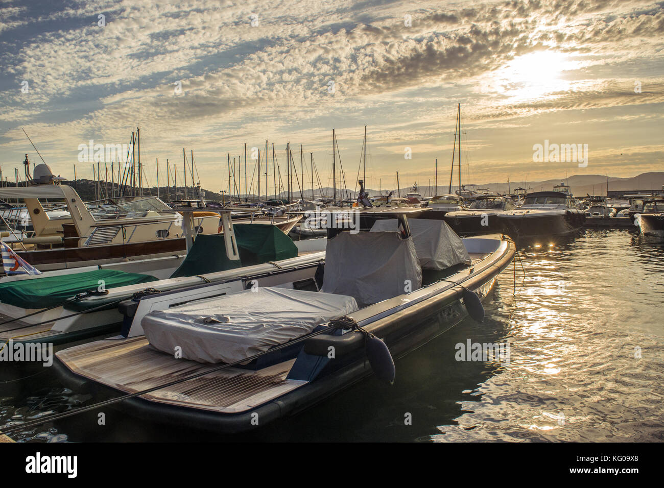 Boats in the sunset Stock Photo - Alamy
