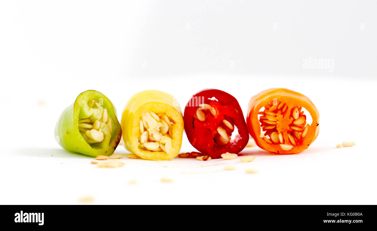 image of a colorful chili pepper on white background Stock Photo - Alamy