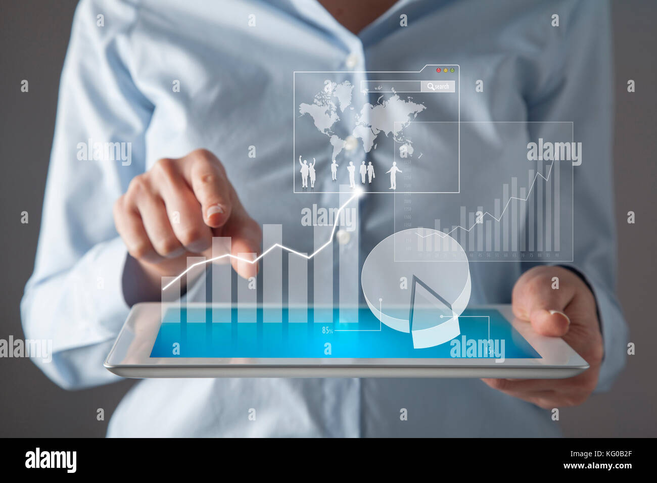 Businesswoman in front of visual touch screen Stock Photo - Alamy