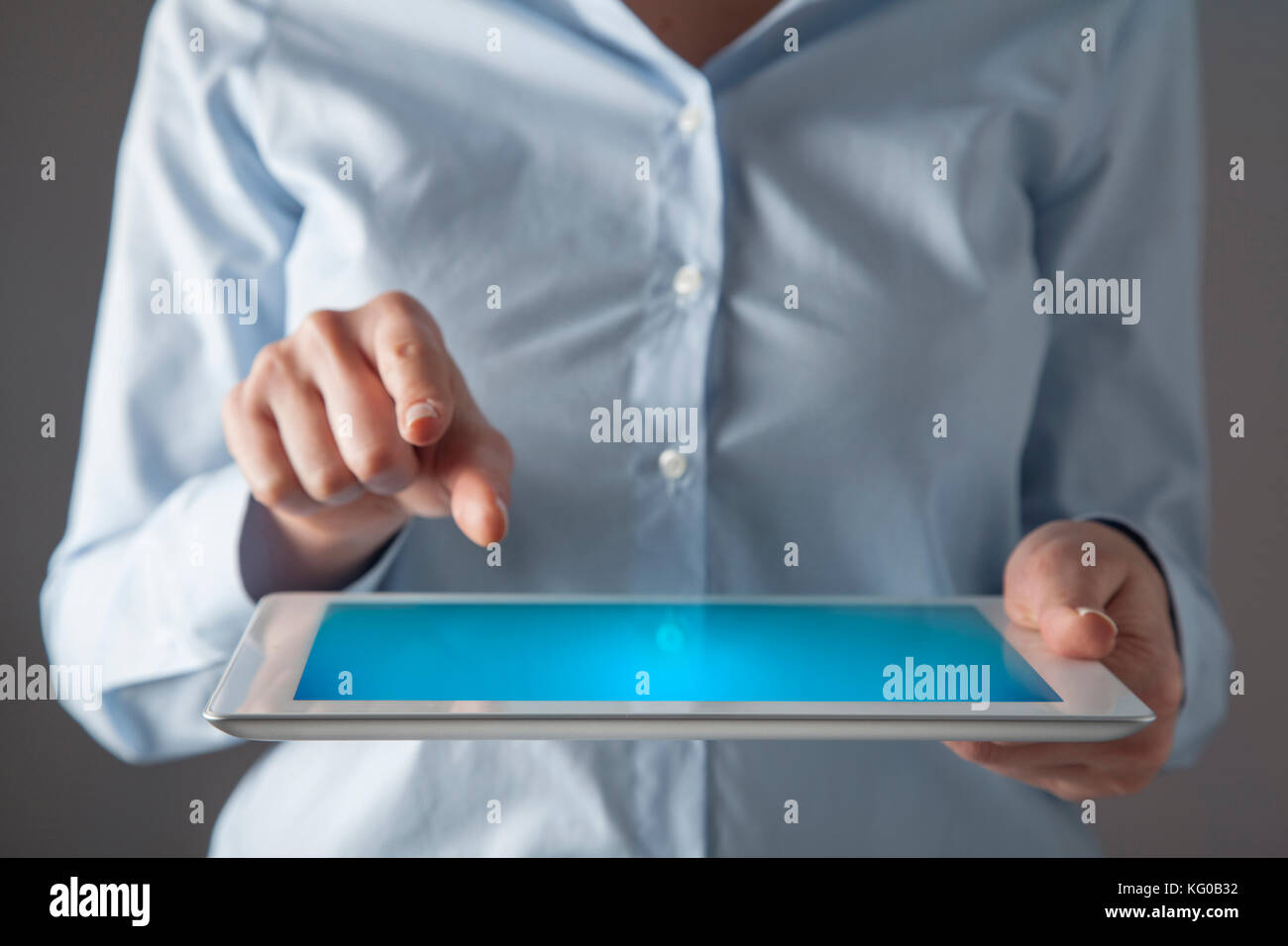 Businesswoman in front of visual touch screen Stock Photo - Alamy