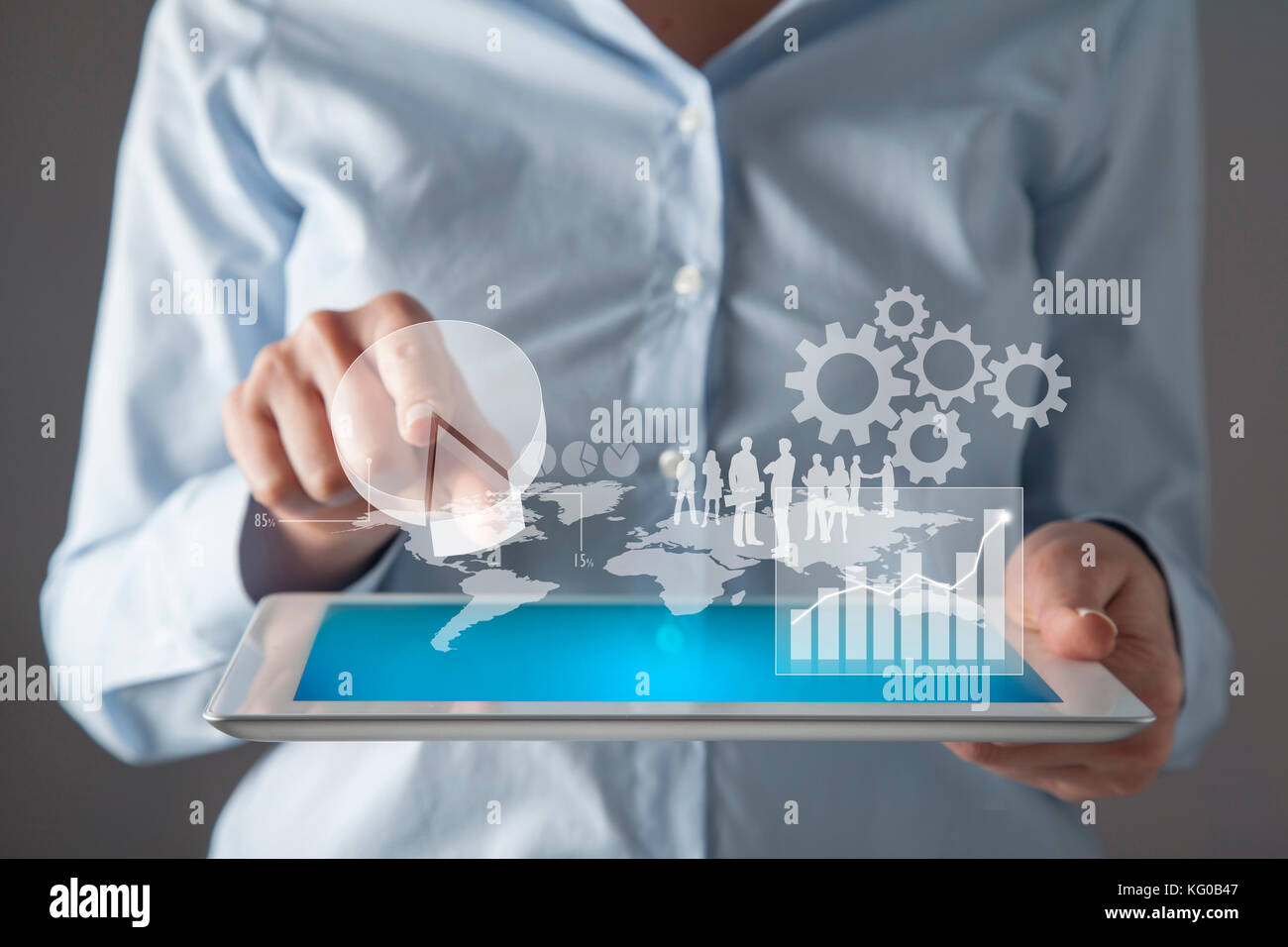 Businesswoman in front of visual touch screen Stock Photo - Alamy