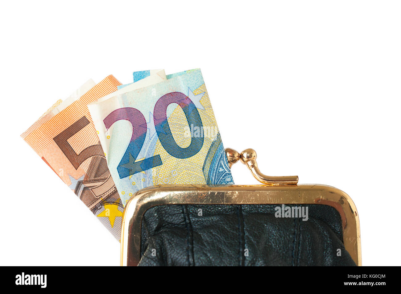 Detail of a coin purse isolated on white background with banknotes ...