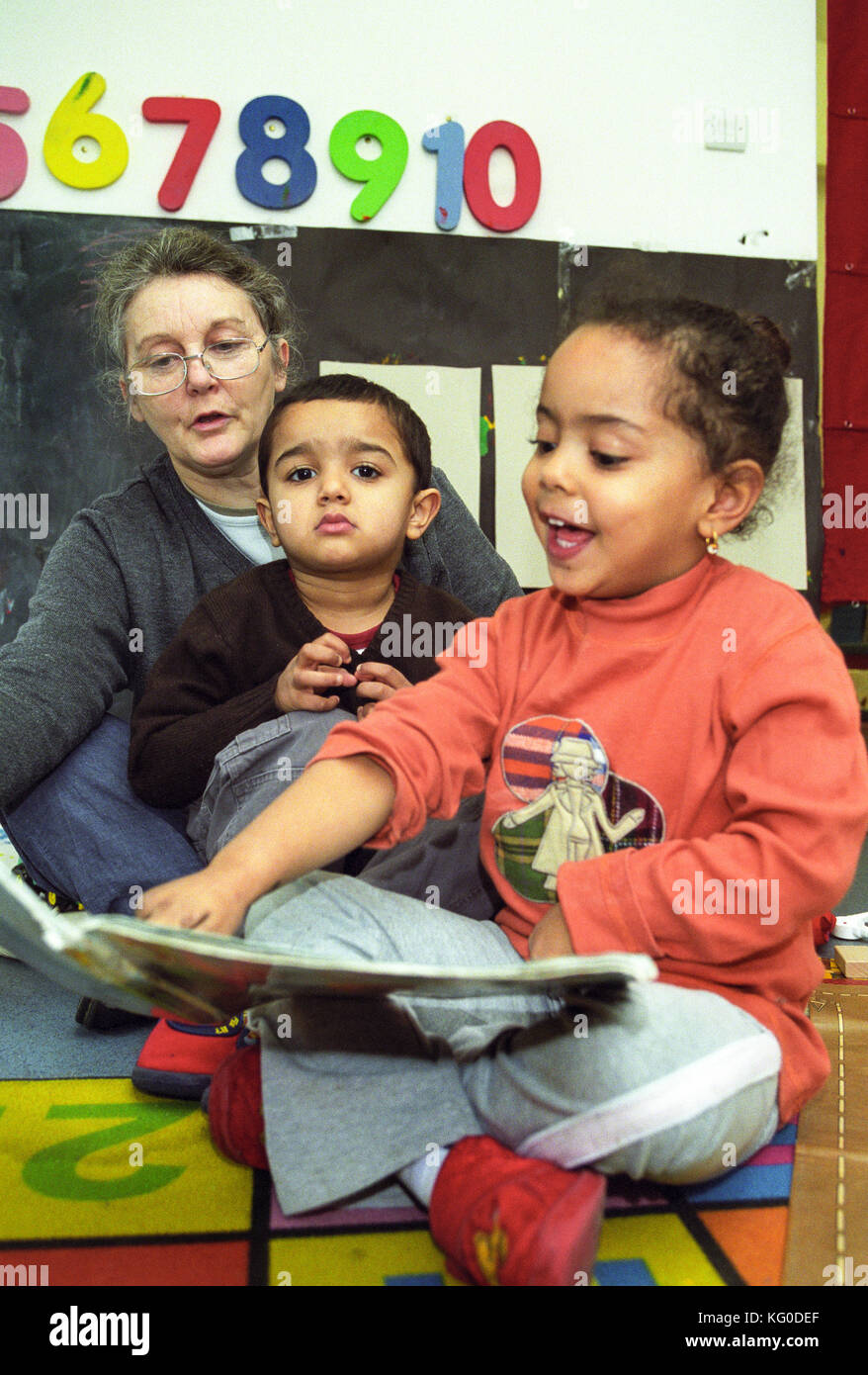 School nursery classroom teacher hi-res stock photography and images ...