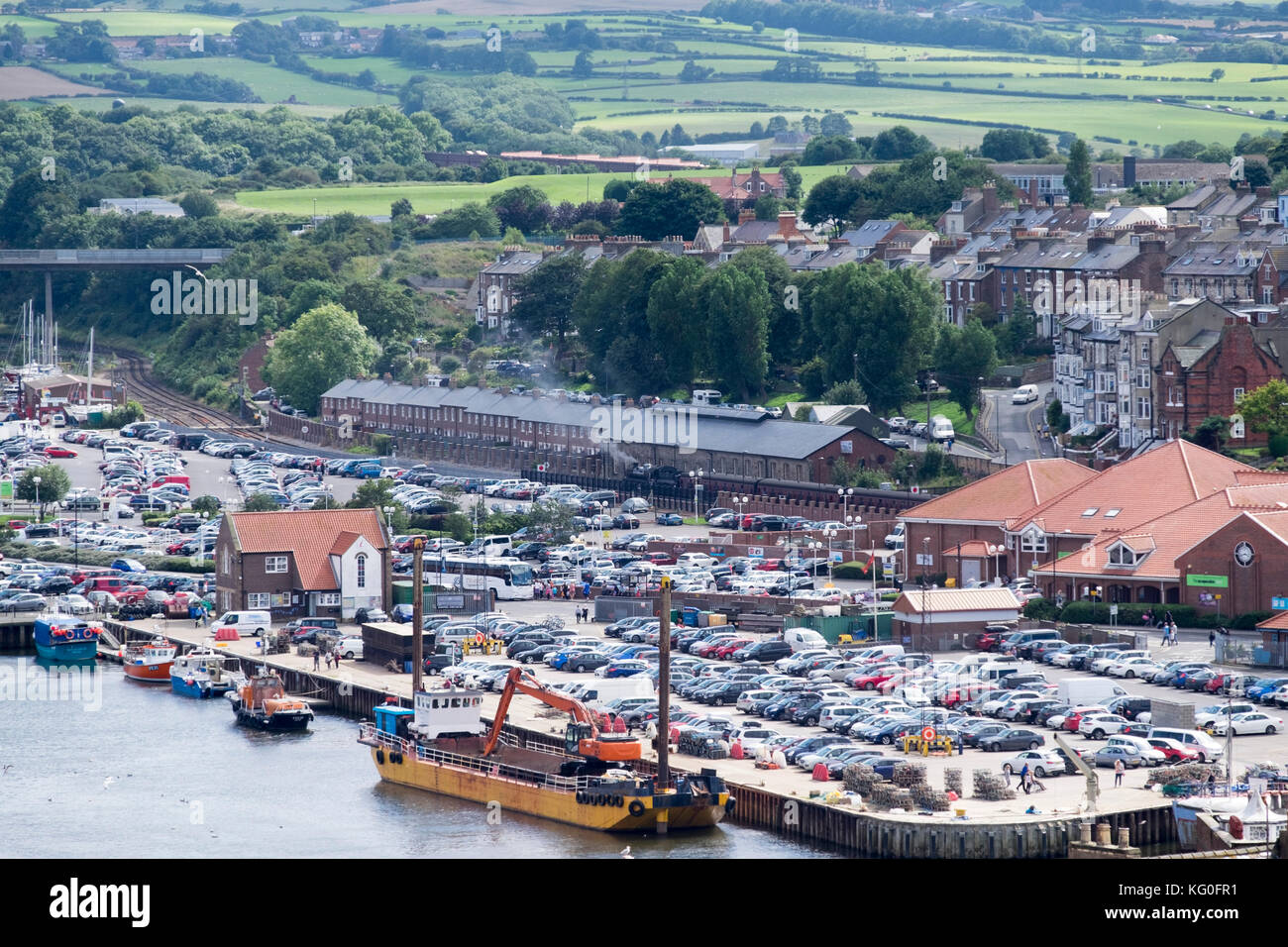 Vintage Steam train seen across Whitby Harbour Stock Photo - Alamy