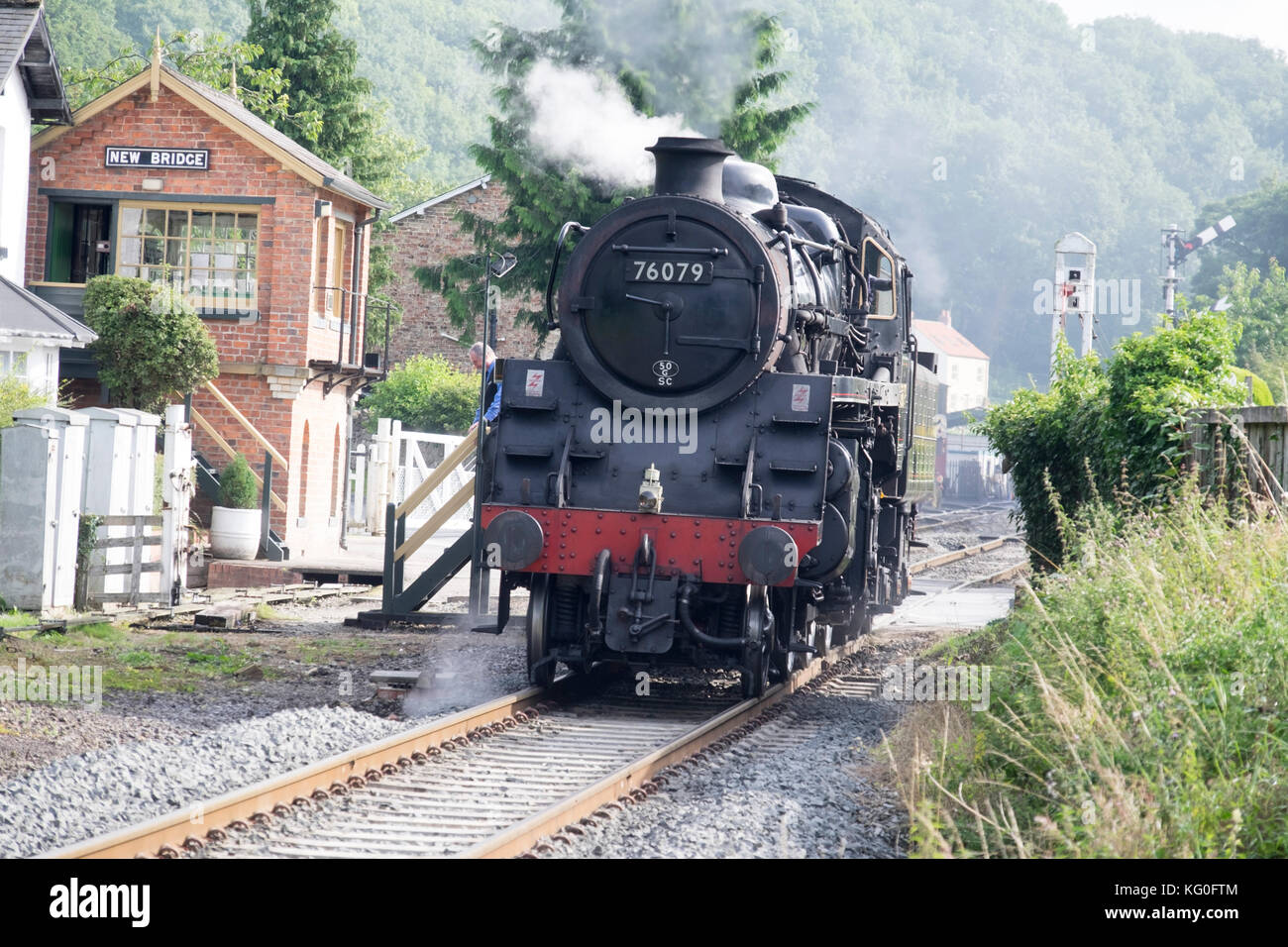 Steam Engine 76079 pulls passenger service on the North Yorkshire Moors ...