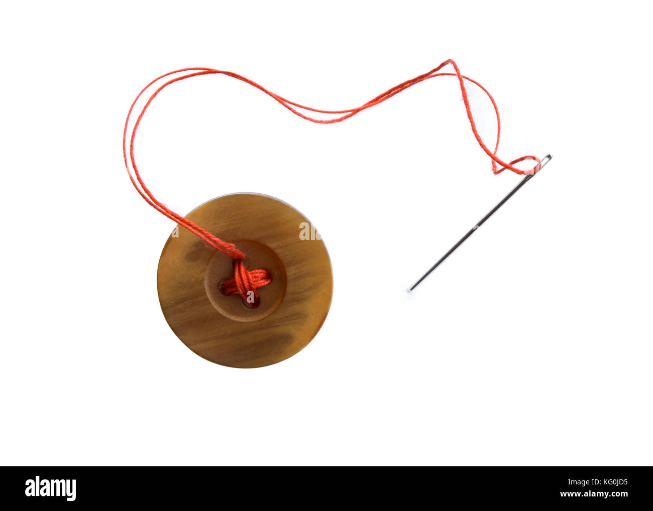 Closeup of button and needle with read thread on white background Stock ...