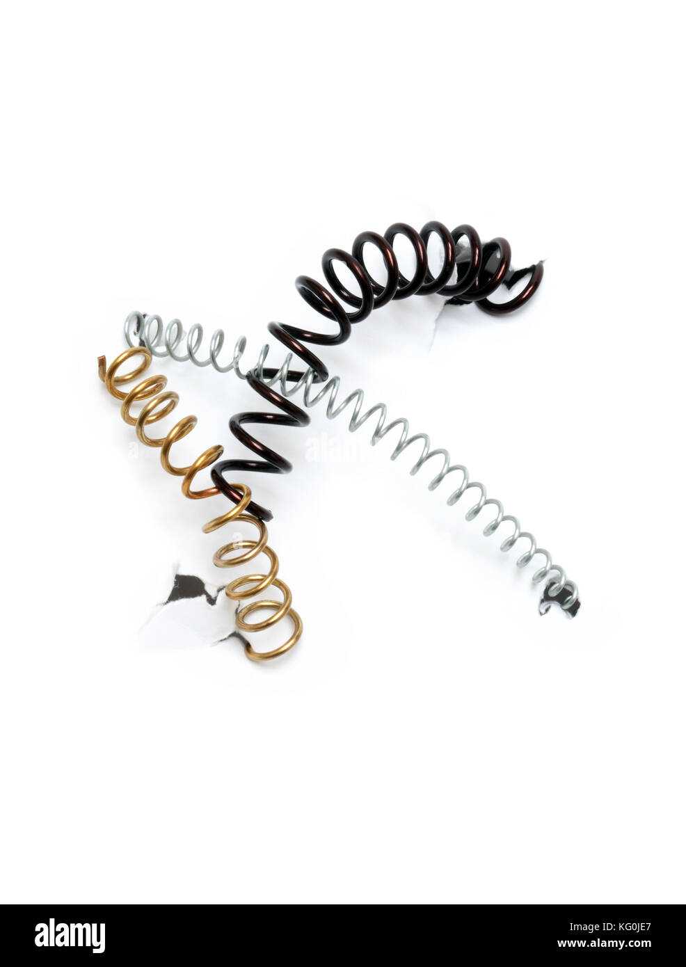Three metal springs on white disrupt paper background Stock Photo - Alamy