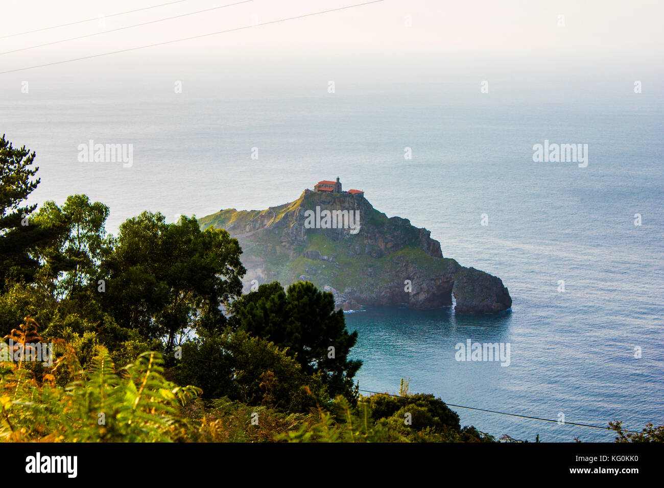 Sunset at San Juan de Gaztelugatxe, a famous peninsula in the coast of ...