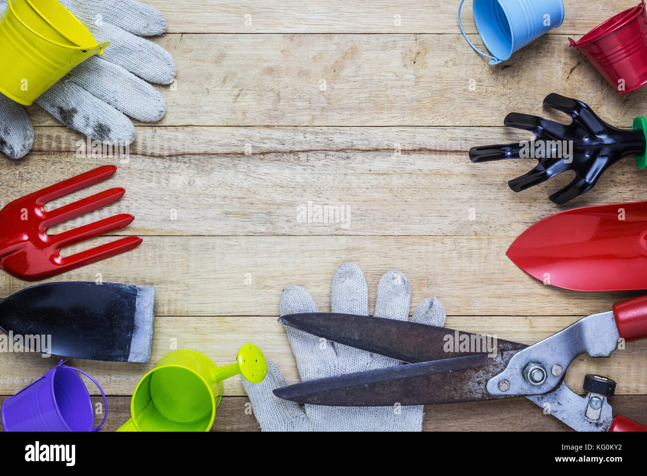 A photo of Agricultural tools on wood table Stock Photo - Alamy