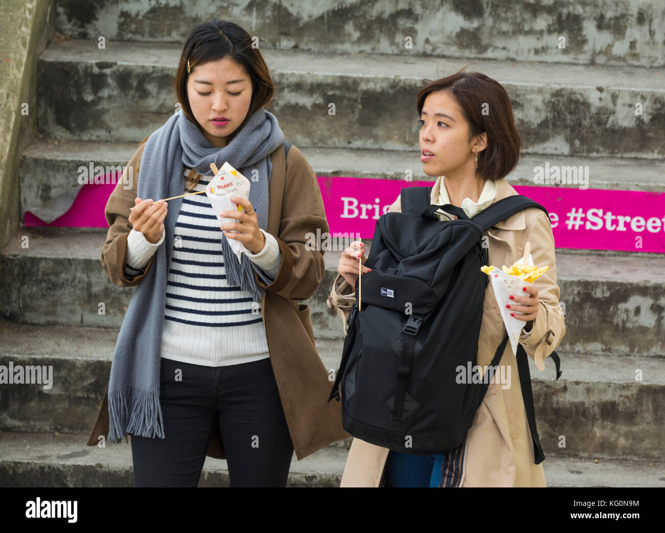Female asians takeaway hi-res stock photography and images - Alamy