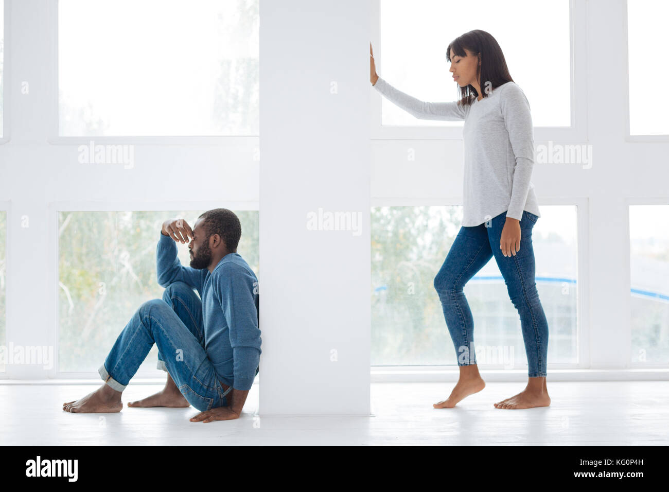 Offended young people not talking to each other Stock Photo - Alamy