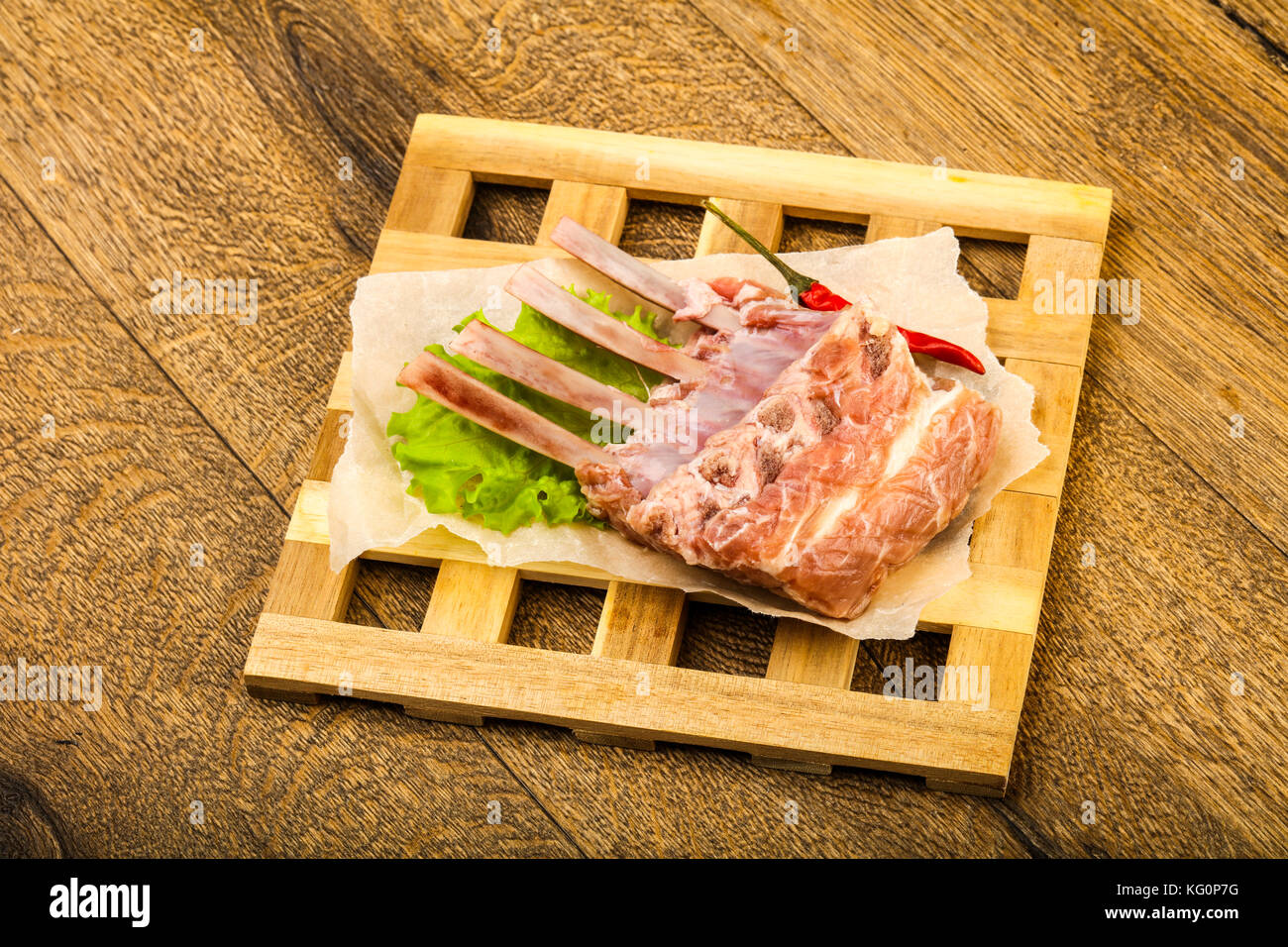 Raw lamb ribs with pepper ready for cooking Stock Photo - Alamy