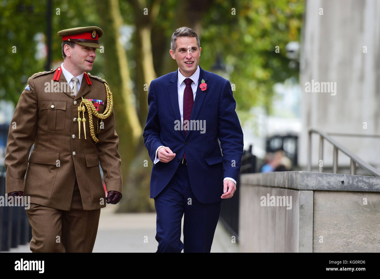 Gavin Williamson (right) outside the Ministry of Defence in London ...