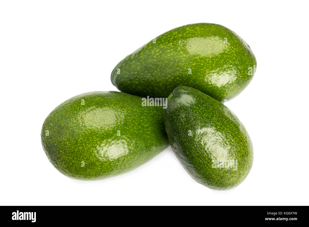 Three whole avocados isolated on white background Stock Photo - Alamy
