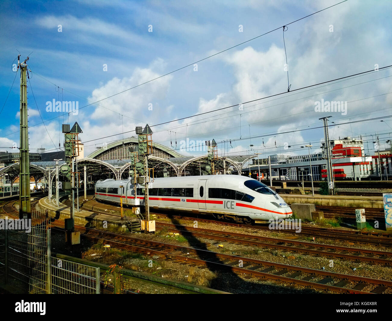 Intercity Express ICE train at railway station in Cologne, Germany ...