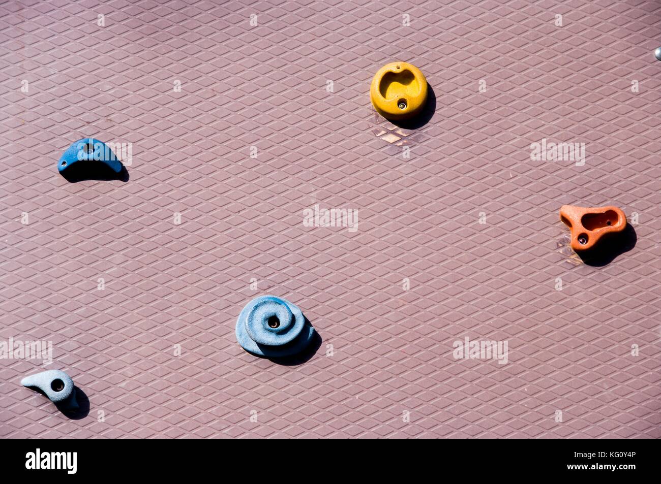 Wall prepared to practise the escalation(climbing) with handles of ...