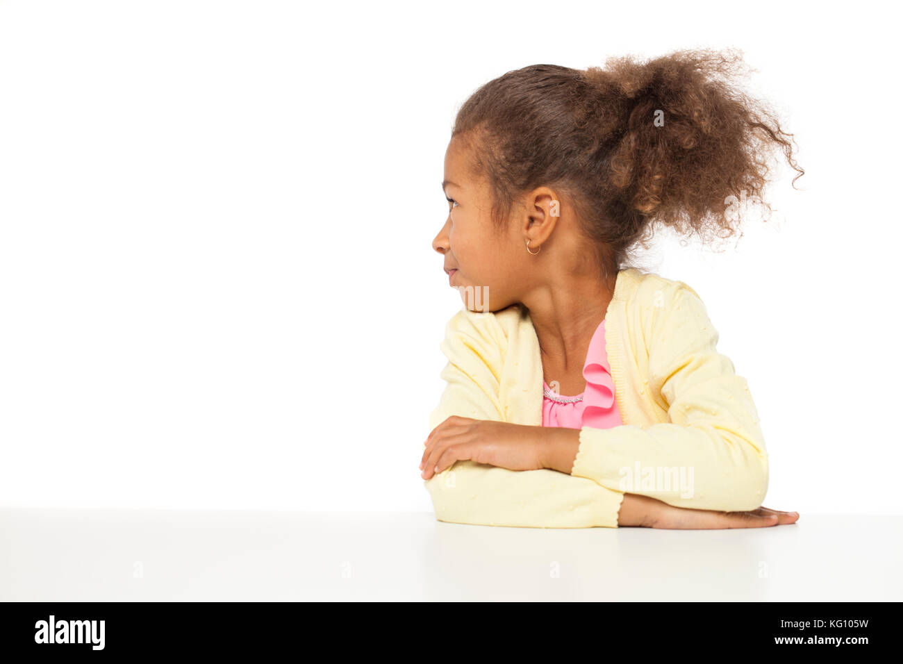 Close up portrait of little african girl with afro hairstyle isolated ...