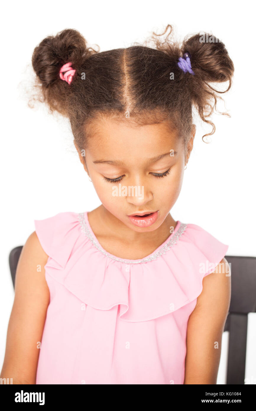 Close up portrait of little african girl with afro hairstyle isolated ...