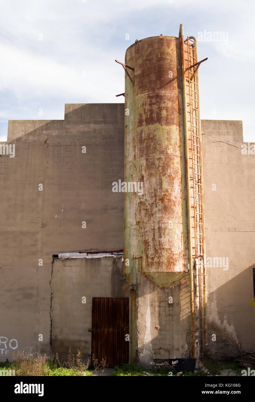 Ancient factory with rusty warehouse Stock Photo - Alamy