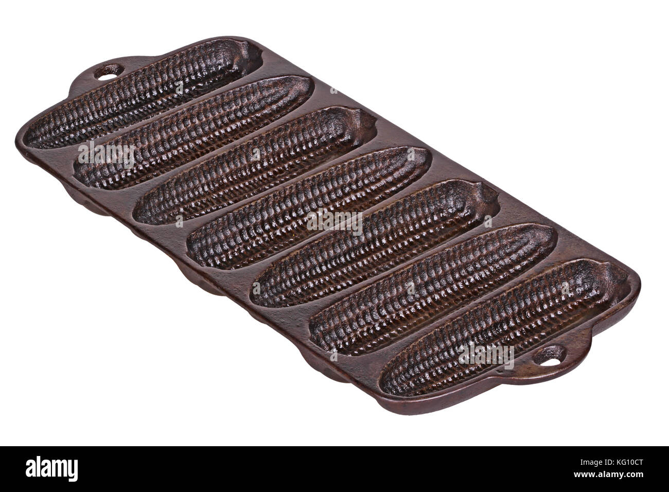 Old but seasoned cast-iron pan ready for baking cornbread sticks in the ...