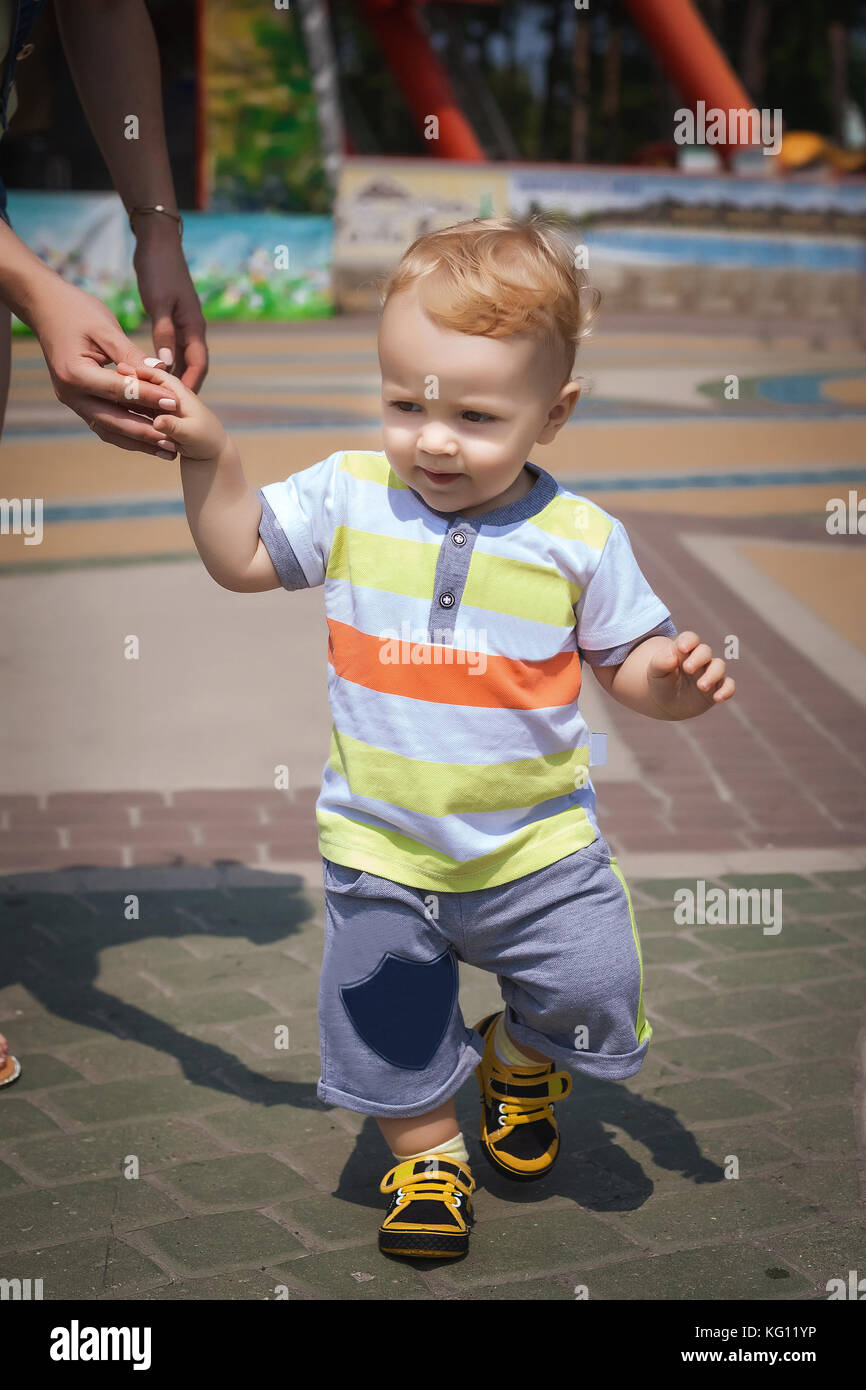 little boy learns to walk Stock Photo - Alamy