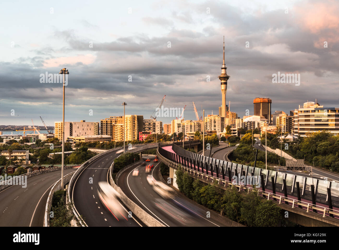 Cars rushing along the spaghetti junction of various highways in ...