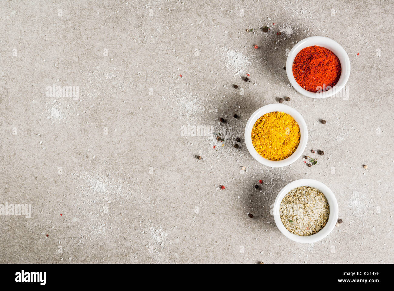 Various spices and seasonings. Cooking background. Turmeric, curry ...