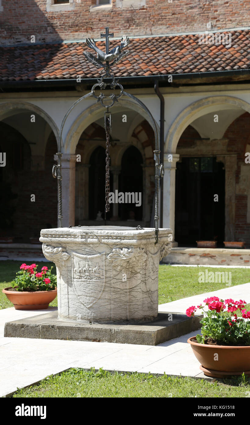 ancient well in a cloister in the ancient monastery of the friars in ...
