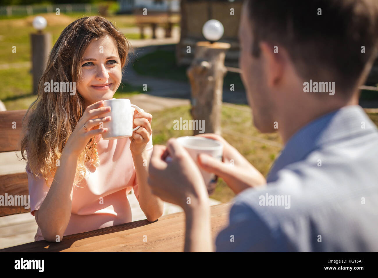 romantic couple drinking tea outdoors Stock Photo - Alamy