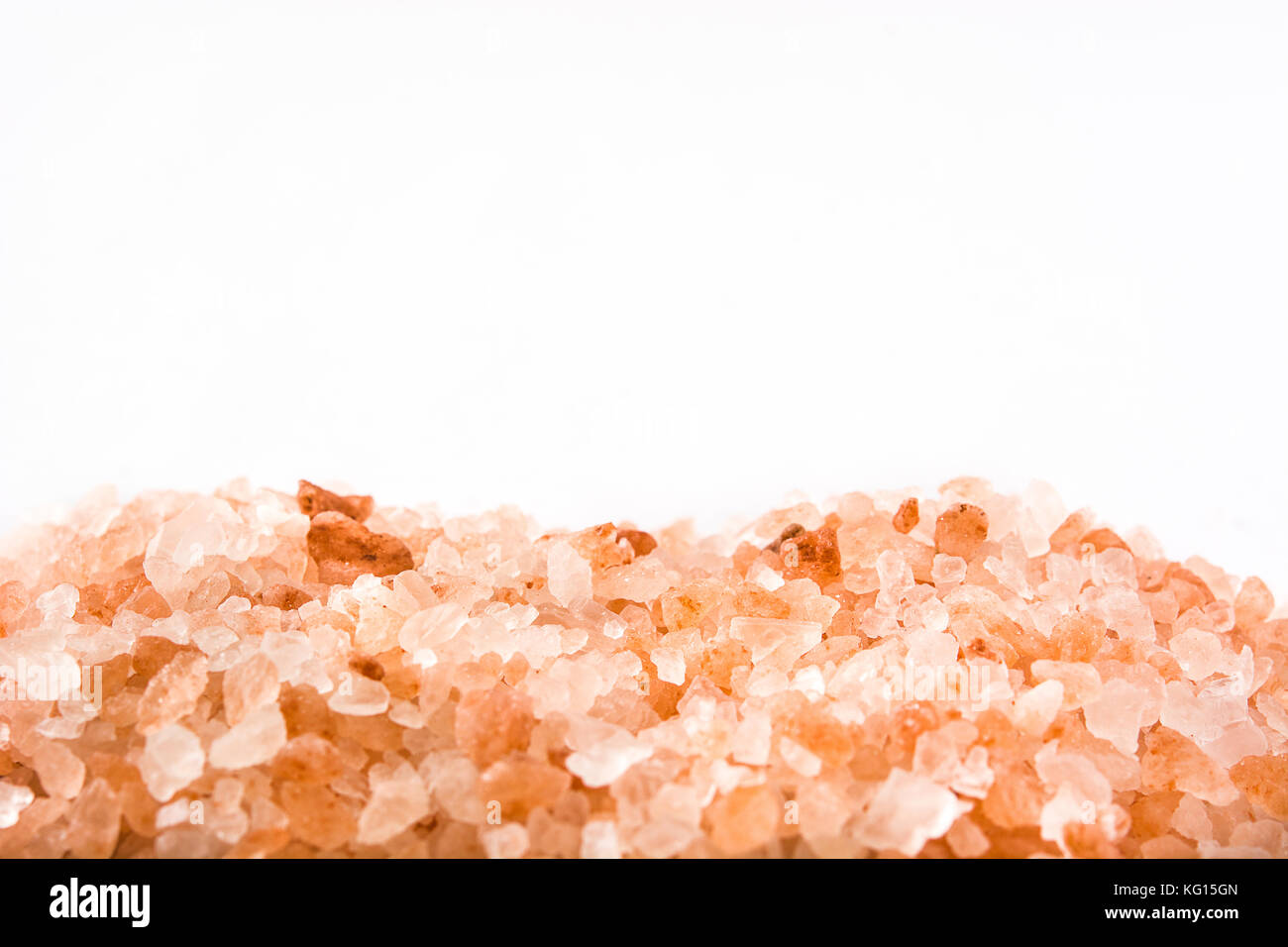 Himalayan salt isolated on white background Stock Photo - Alamy