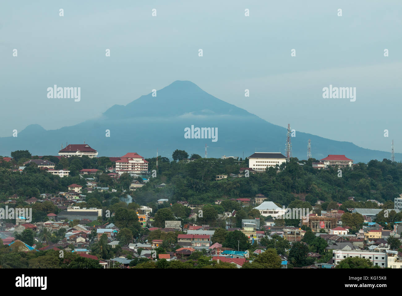 High view over buildings and rooftops of Manado City, North Sulawesi ...