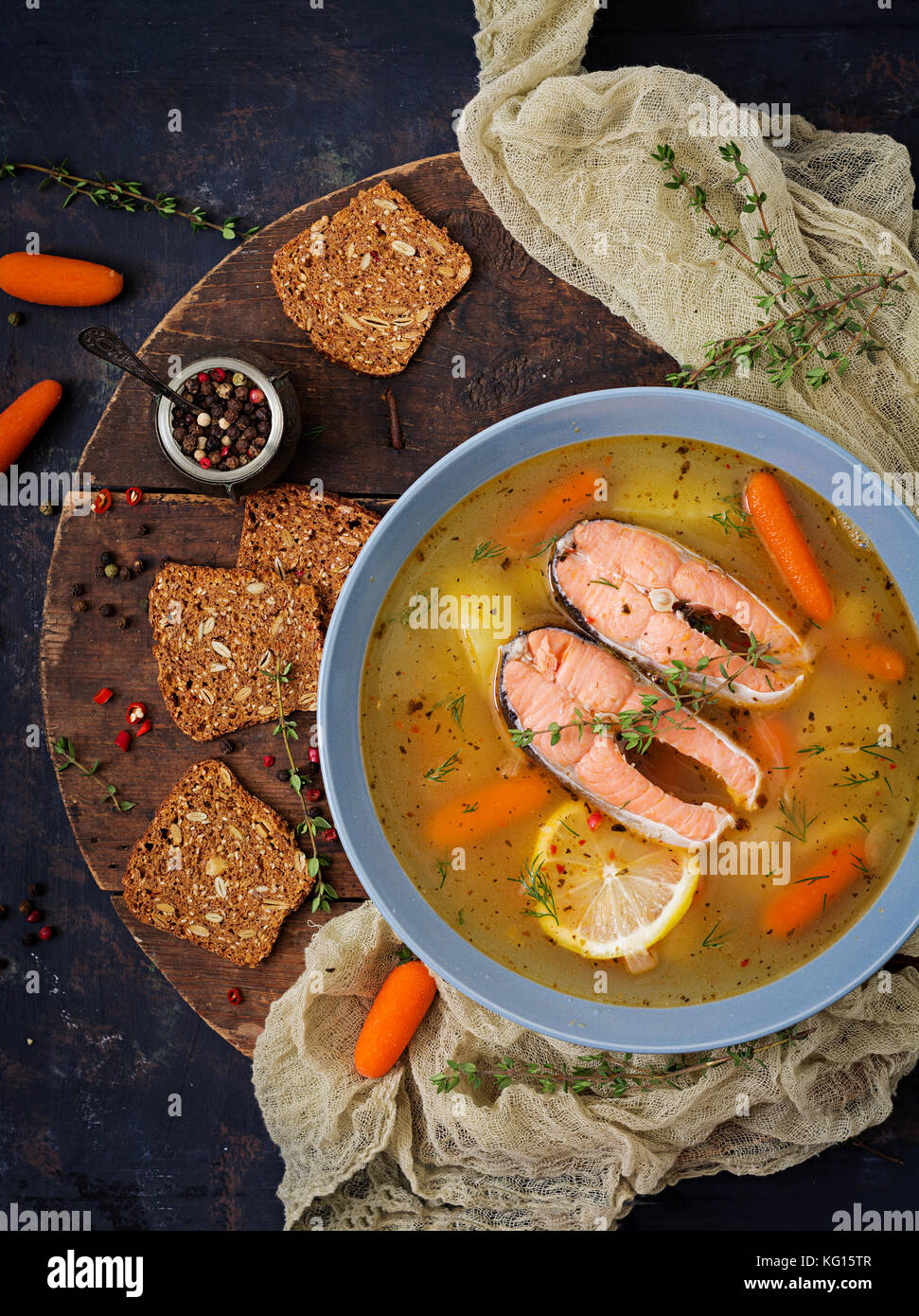 Salmon fish soup with vegetables in bowl. Flat lay. Top view Stock ...
