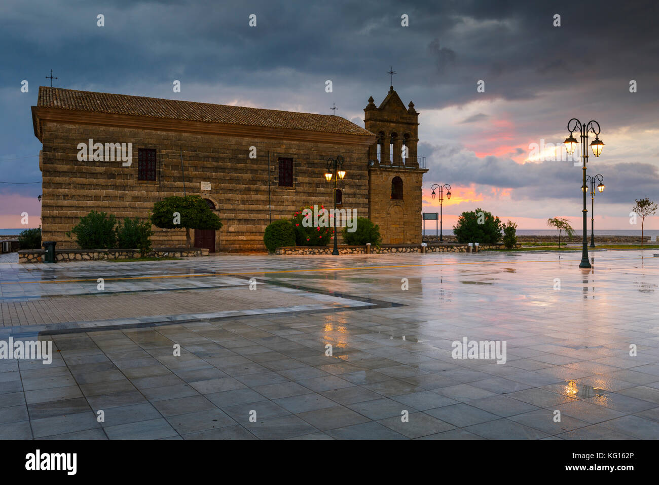 Sunrise at St Nikolaos Molou church in Solomos square in Zakynthos town ...