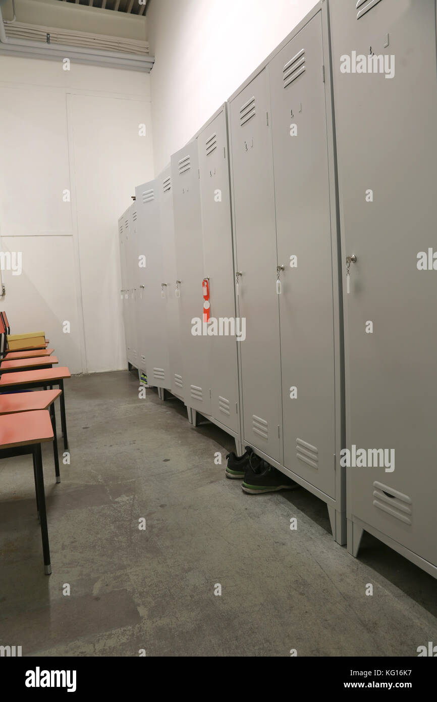 inside a factory locker with lockers and chairs Stock Photo - Alamy