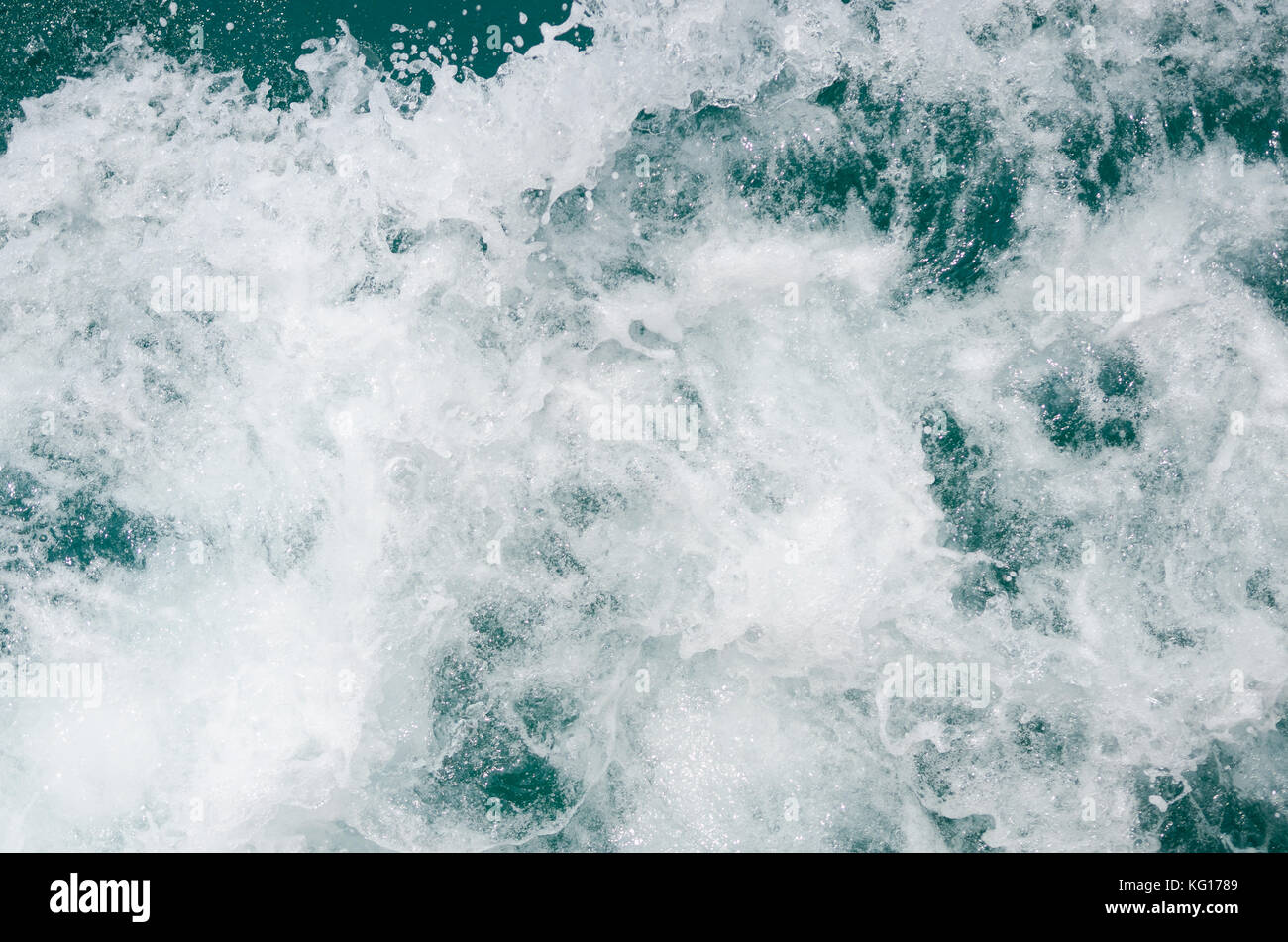 Close up blue water splash. water spray from the waves Stock Photo - Alamy