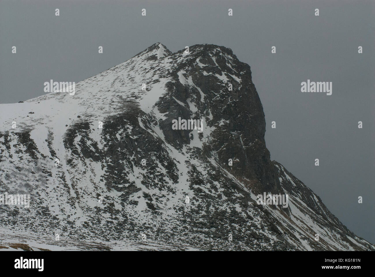Very high mountains by the Atlantic Ocean in peninsula Lofoten, Norway ...