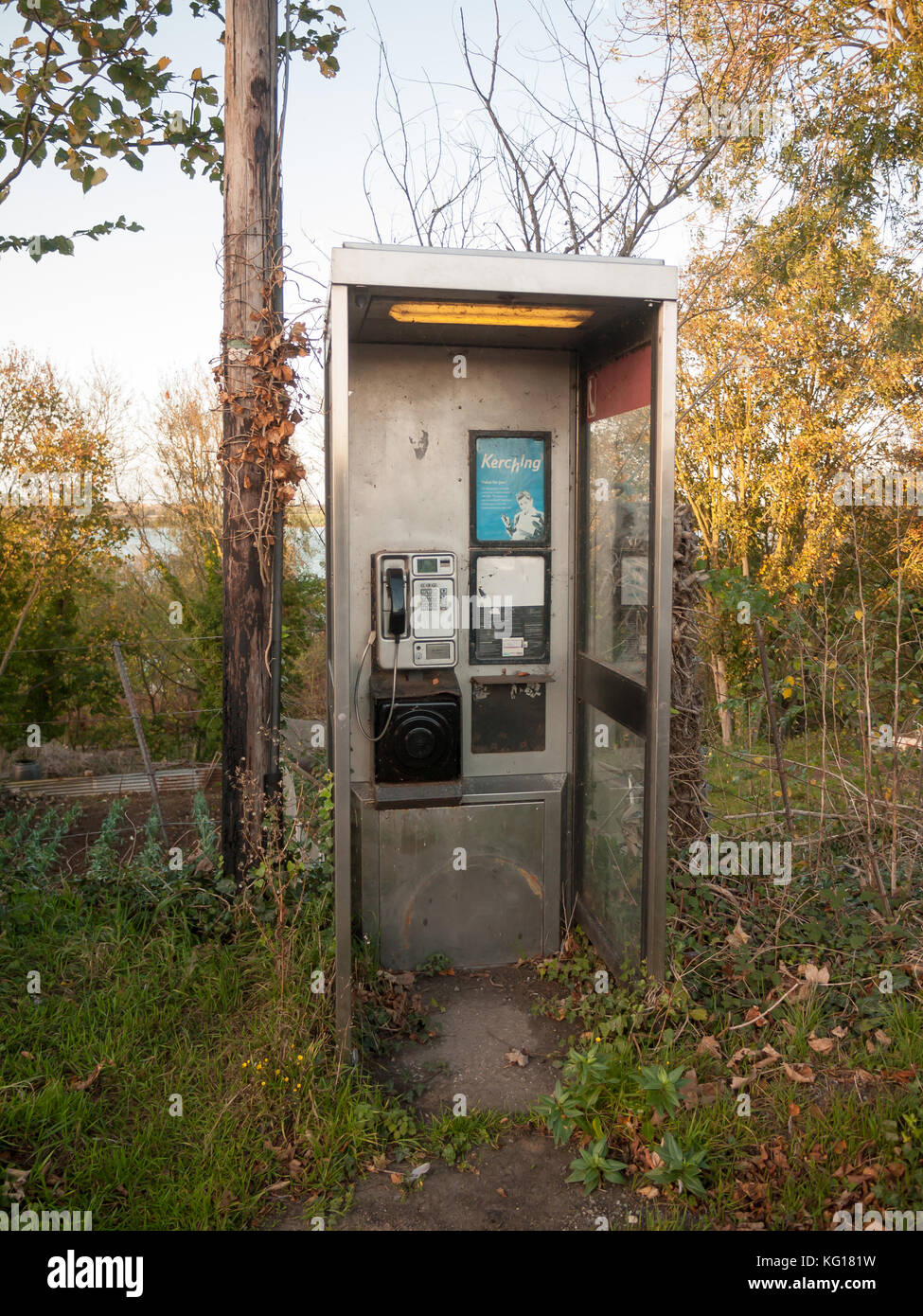 dirty modern telephone box no door empty no people; essex; england; uk ...