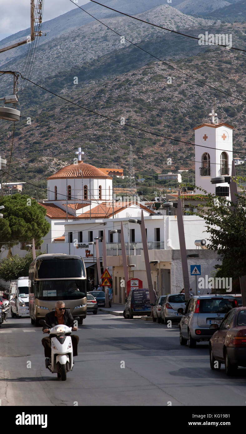 Town centre traffic and church in Malia, Crete, Greece. October 2017 ...