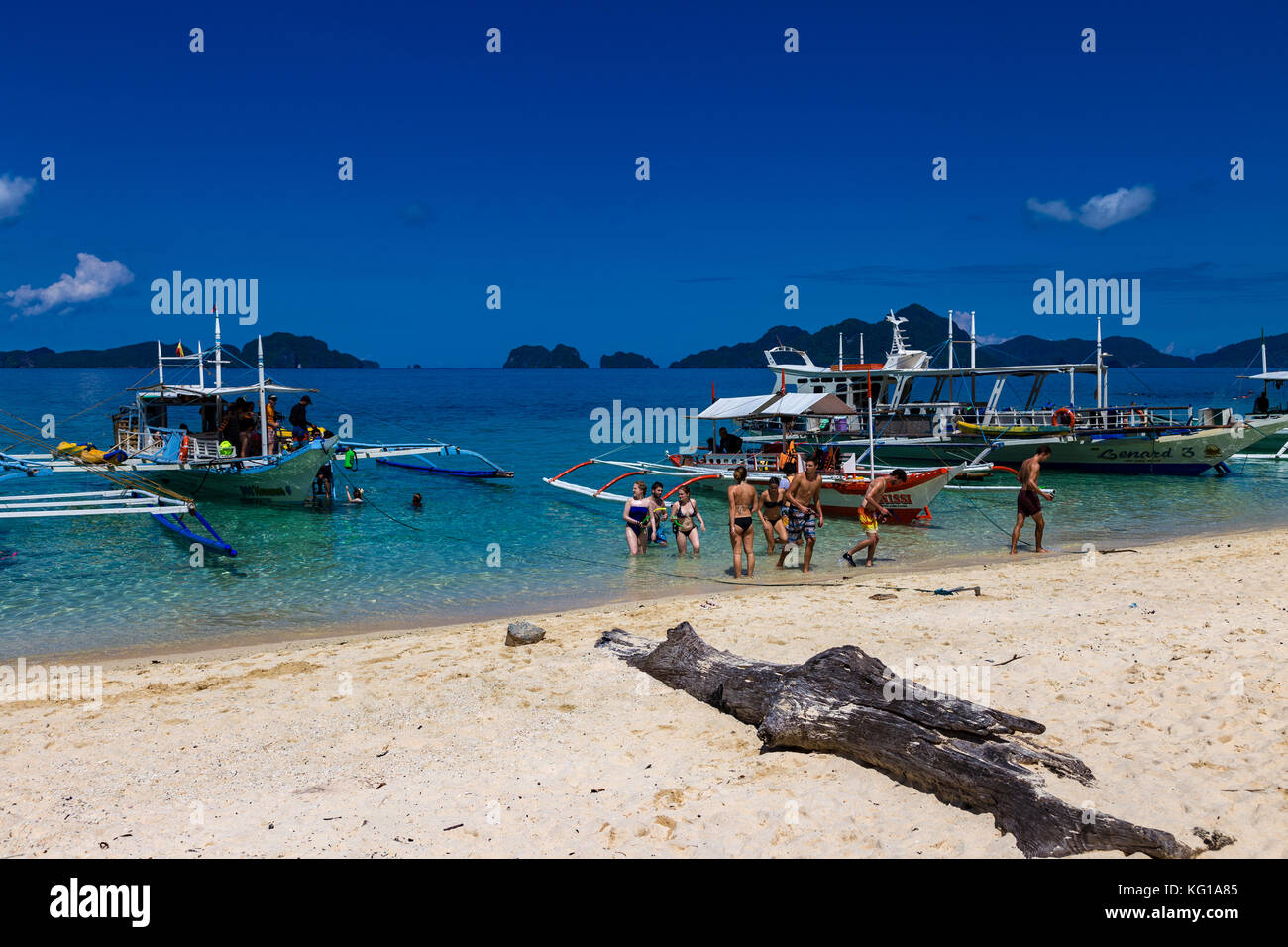 Asia Philippines Palawan El Nido Tour boats on Seven Commando Beach ...